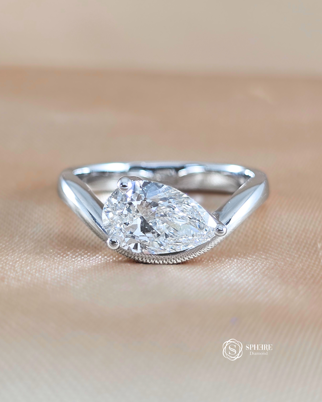 Pear Diamond Curve Ring – Sphere Diamond